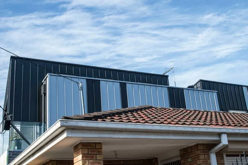 Lincoln Street House features Snaplock and Interlocking panels by Metal ...